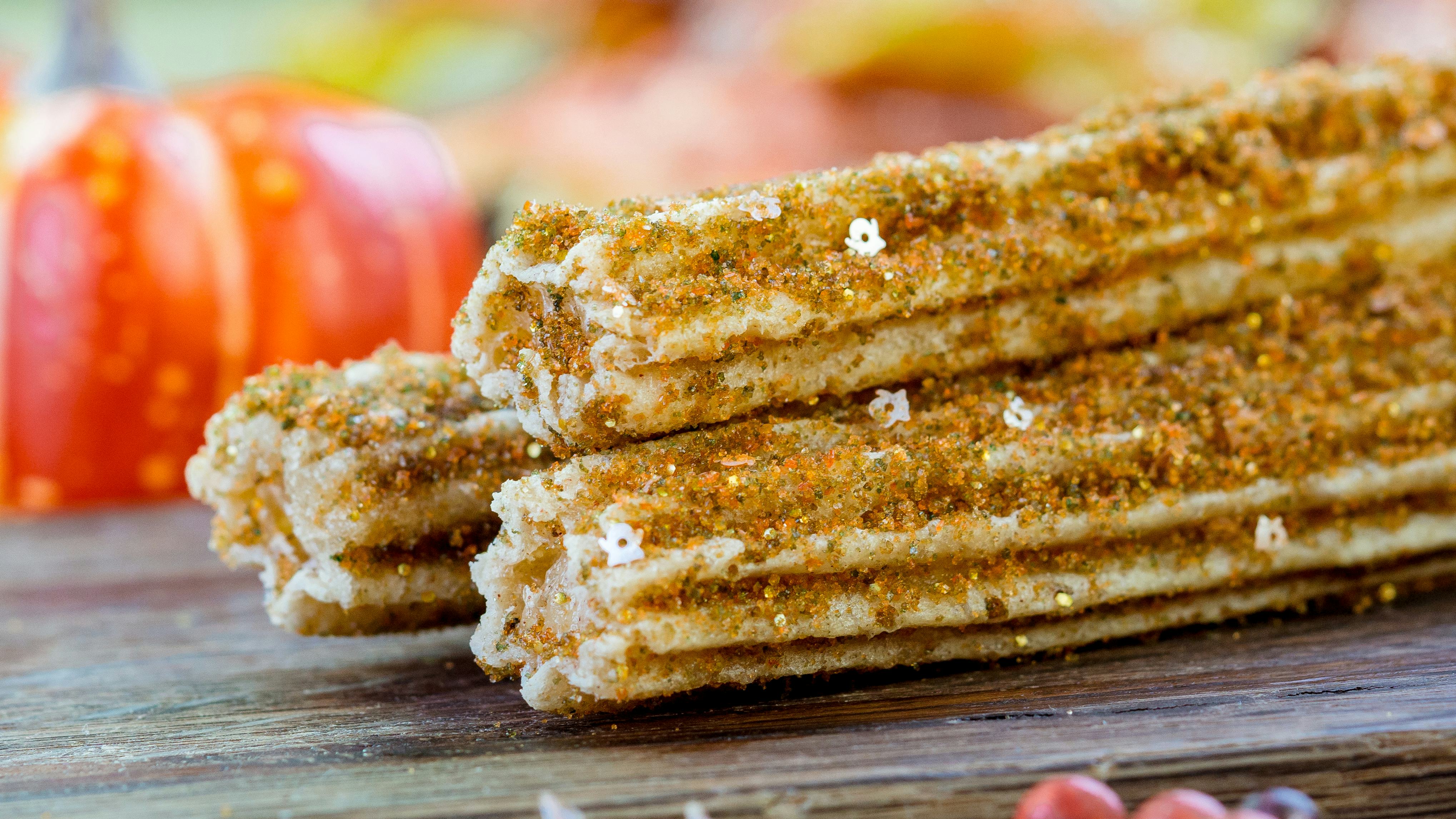 9 Halloween Churros At Disneyland You'll Want To Trick Or Treat Yourself To