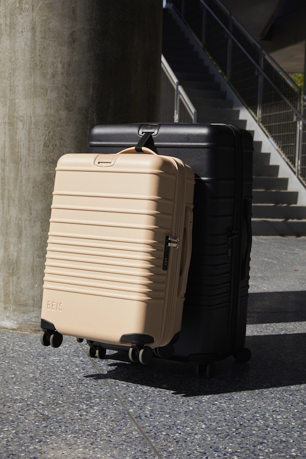 Shay Mitchell's BEIS Rolling Luggage Is Almost Too Chic To Check In